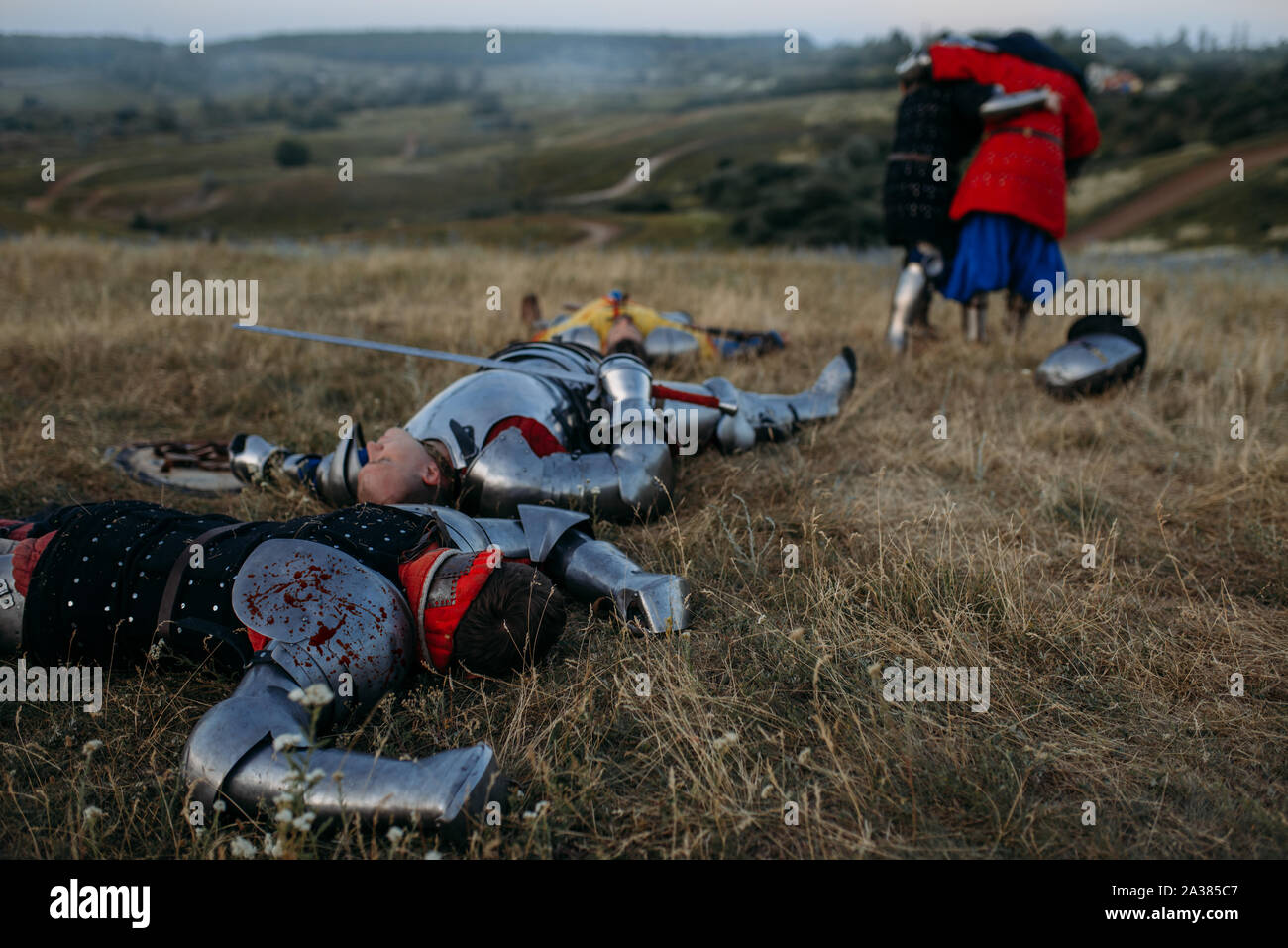 Wounded medieval knights after great battle Stock Photo - Alamy