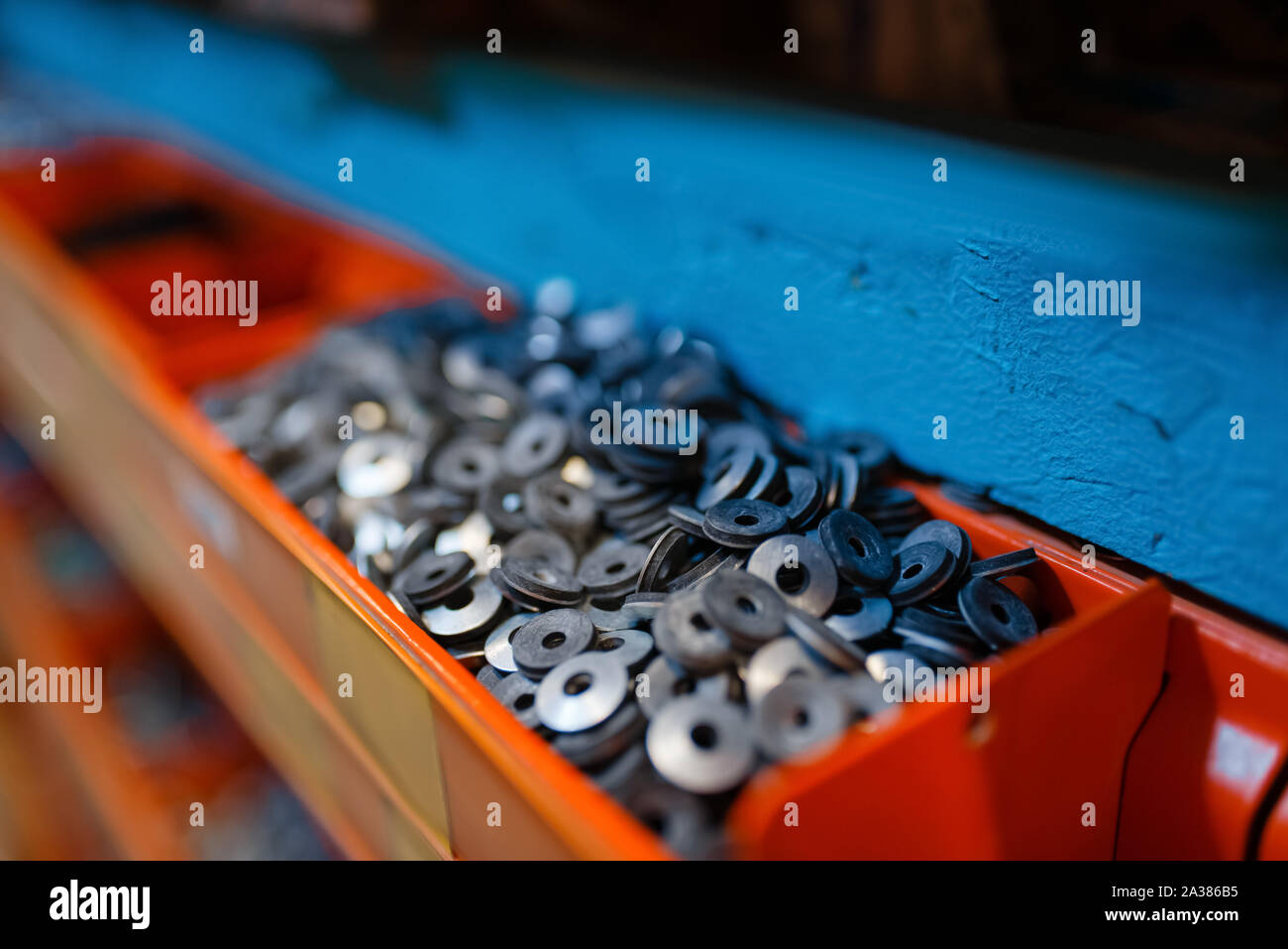 Box with washers in hardware store closeup view Stock Photo - Alamy