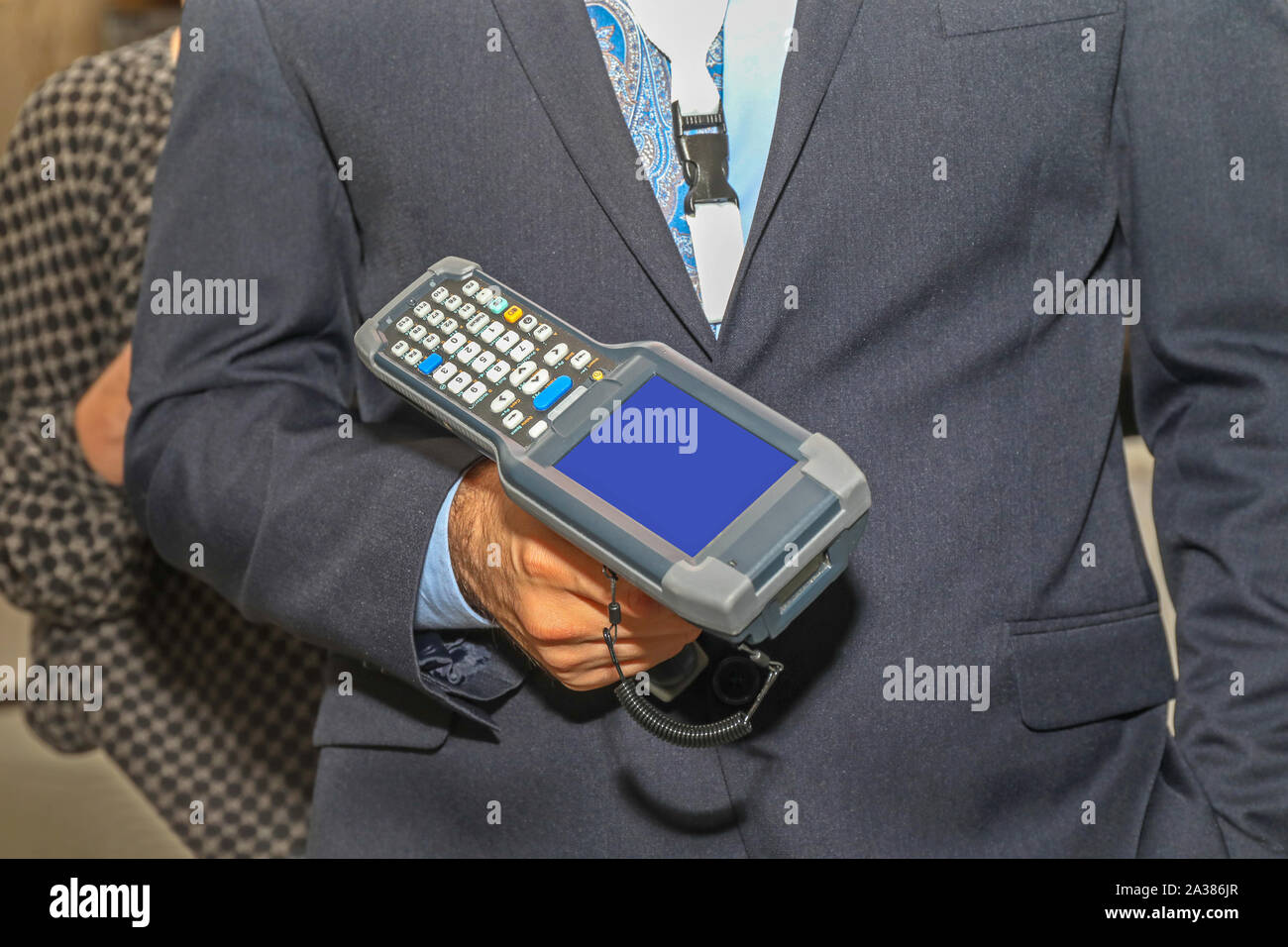 Holding handheld hi-res stock photography and images - Alamy