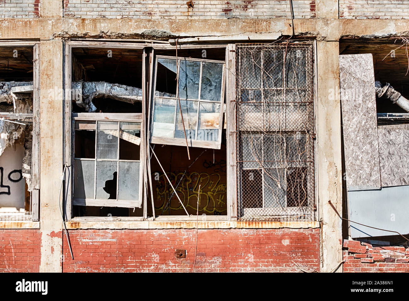 DETROIT, MICHIGAN - APRIL 28, 2019: A broken window opens up to the ...