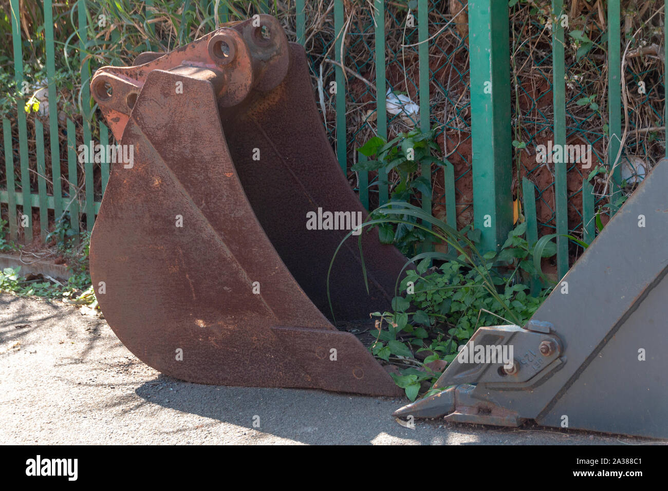 A close up view of a rusted old metal tractor arm Stock Photo - Alamy