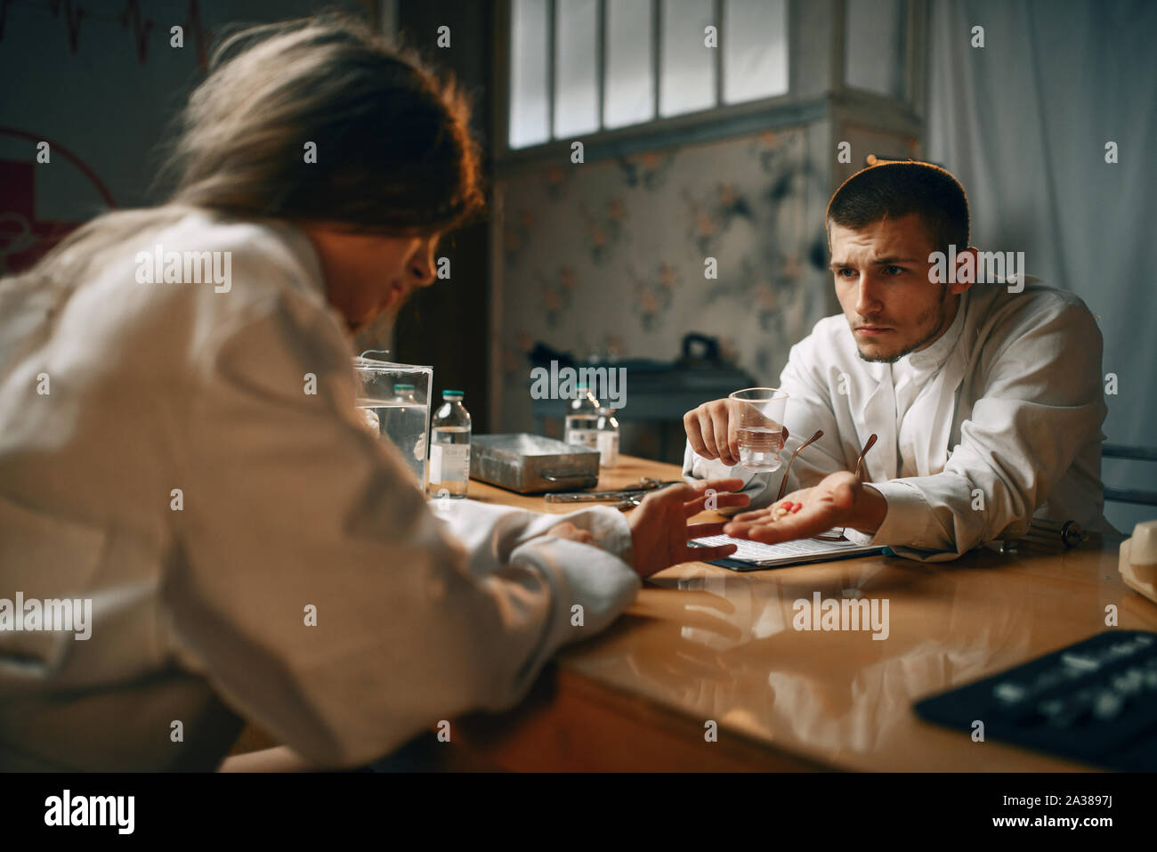 Psychiatrist and female patient, mental hospital Stock Photo - Alamy