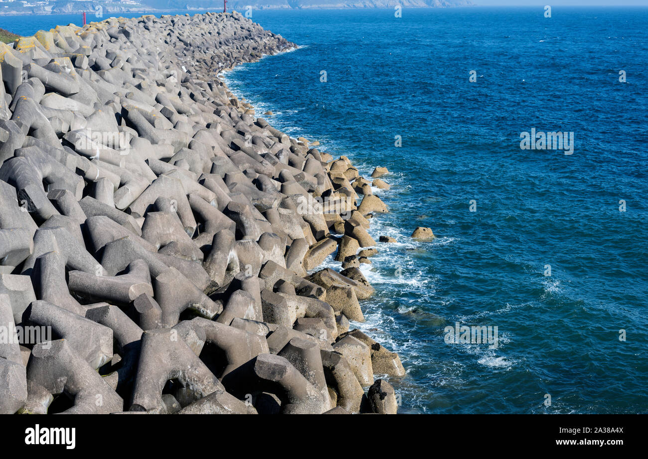 Concrete stabits providing protection from sea at the breakwater or ...