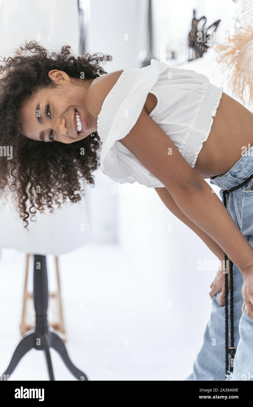 Beautiful girl dancing alone in her light room Stock Photo - Alamy