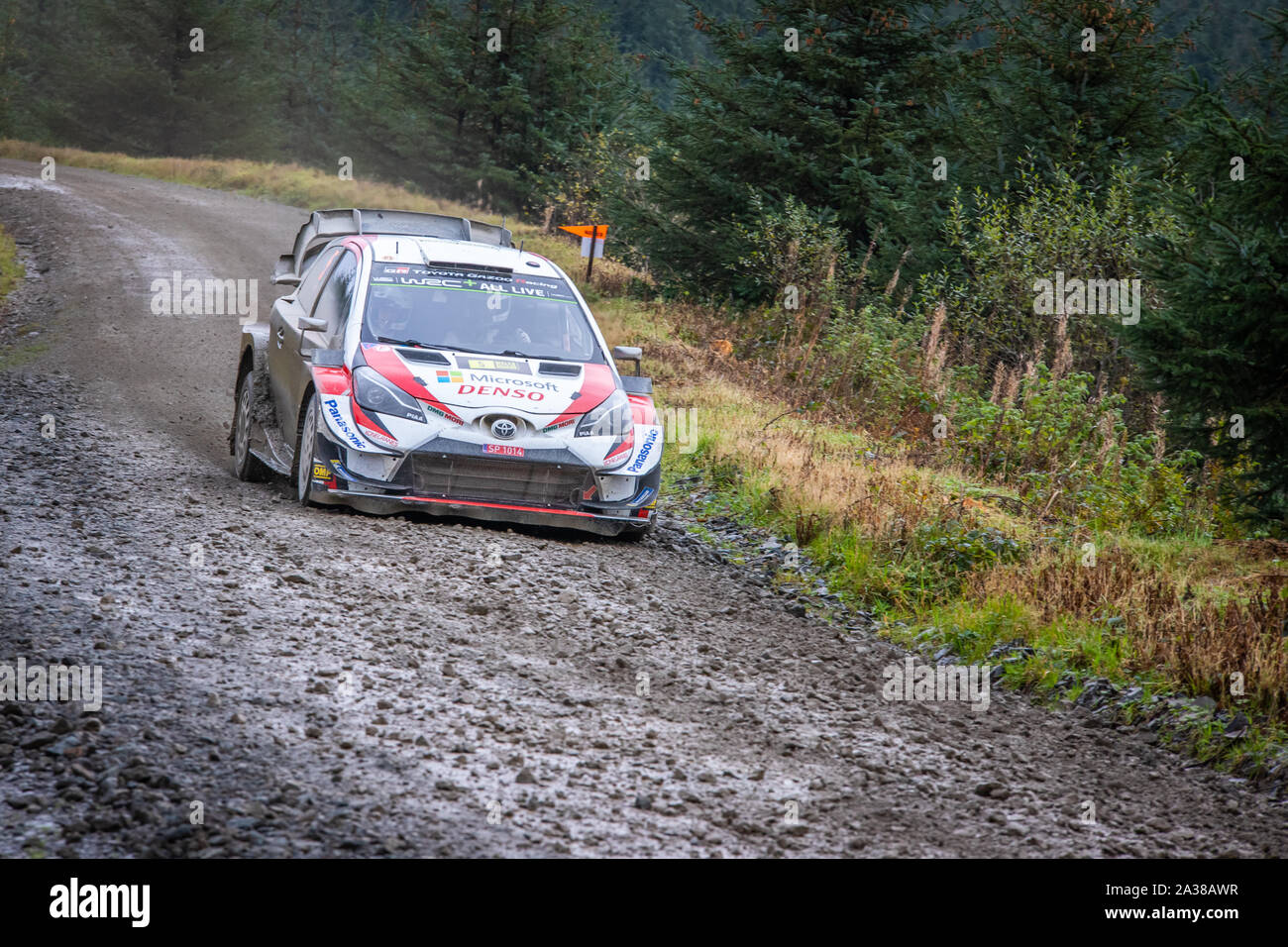 A Toyota World Rally Car driving through the Myherin stage of Wales ...