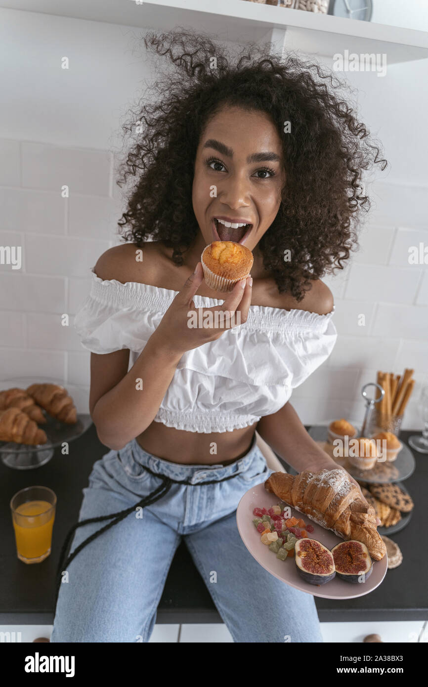 Hungry woman being happy to eat finally Stock Photo - Alamy