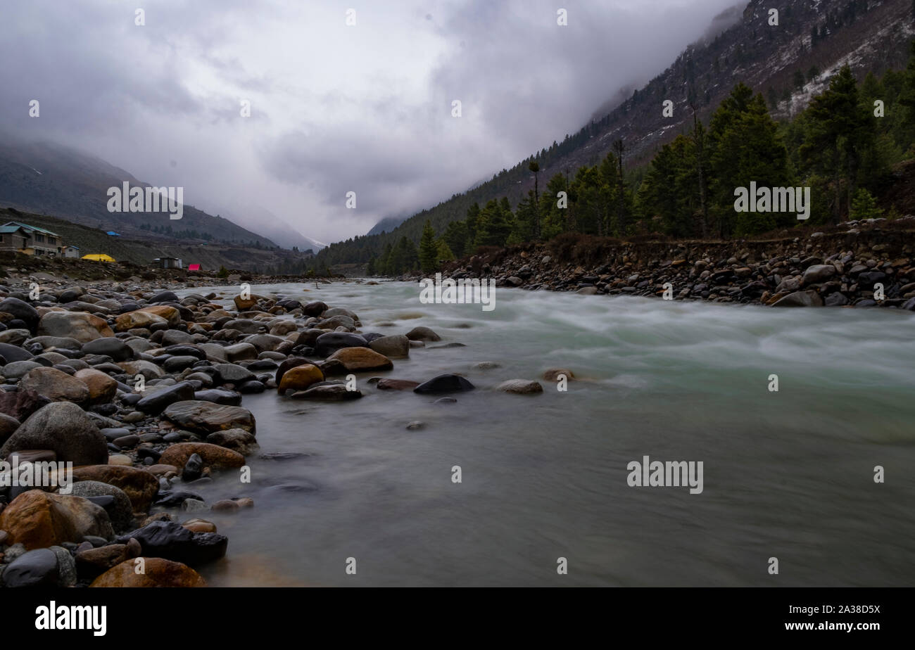 Chitkul village- Baspa river flows through the Sangla valley surrounded ...