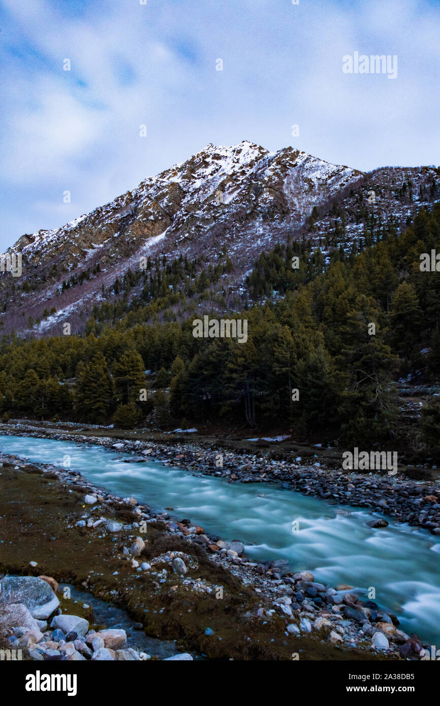 Chitkul village- Baspa river flows through the Sangla valley surrounded ...