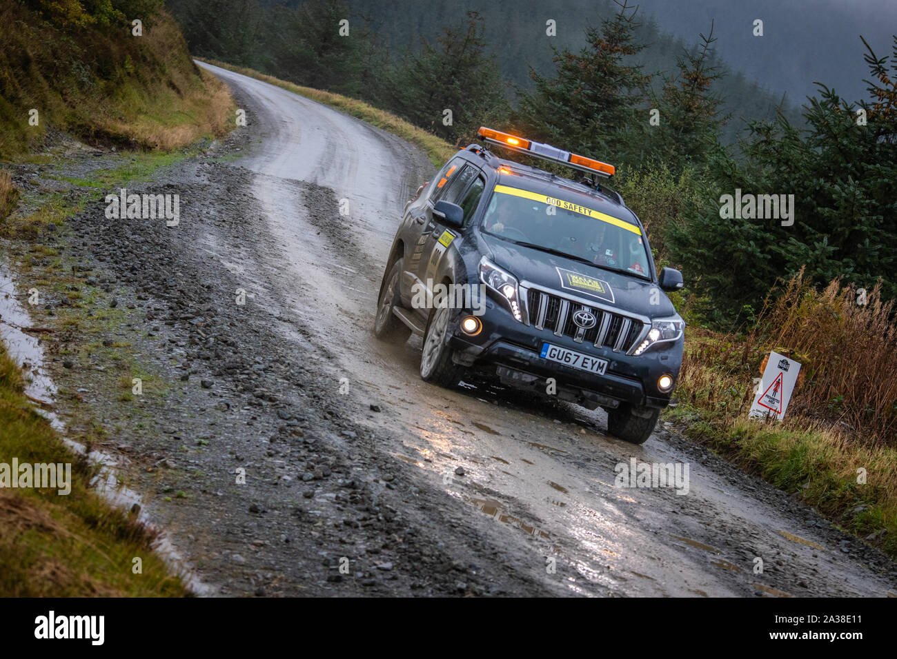 The 000 (Triple Zero) car passes through the Myherin Stage of Wales ...
