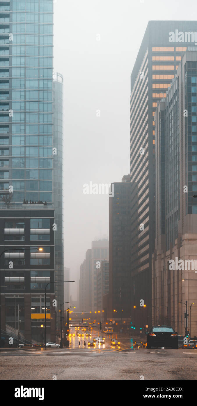 City street on a foggy evening, Chicago, Illinois, United States Stock ...