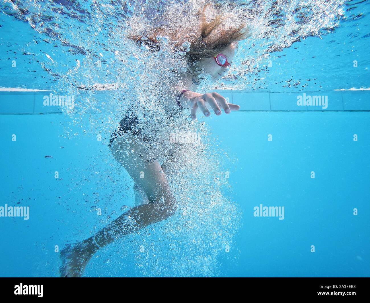 Jumping underwater hi-res stock photography and images - Alamy