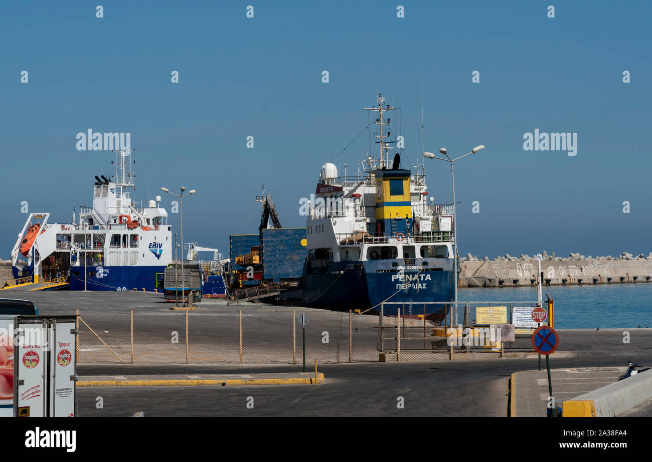 Rethymno, Crete, Greece. September 2019. Cargo ships alongside the quay ...
