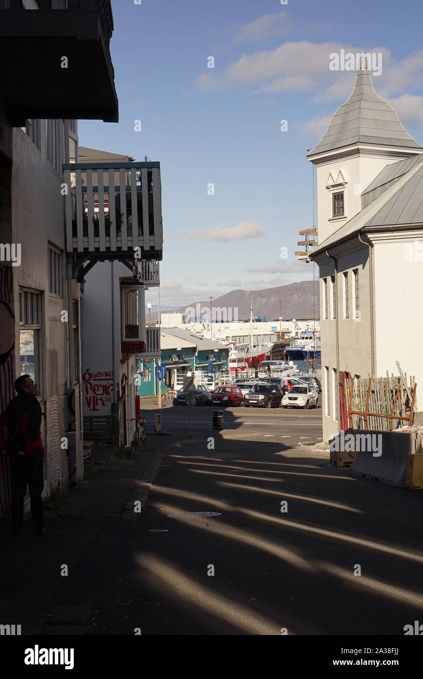 Stripes of sunlight on s street scene in Reykjavik Stock Photo - Alamy