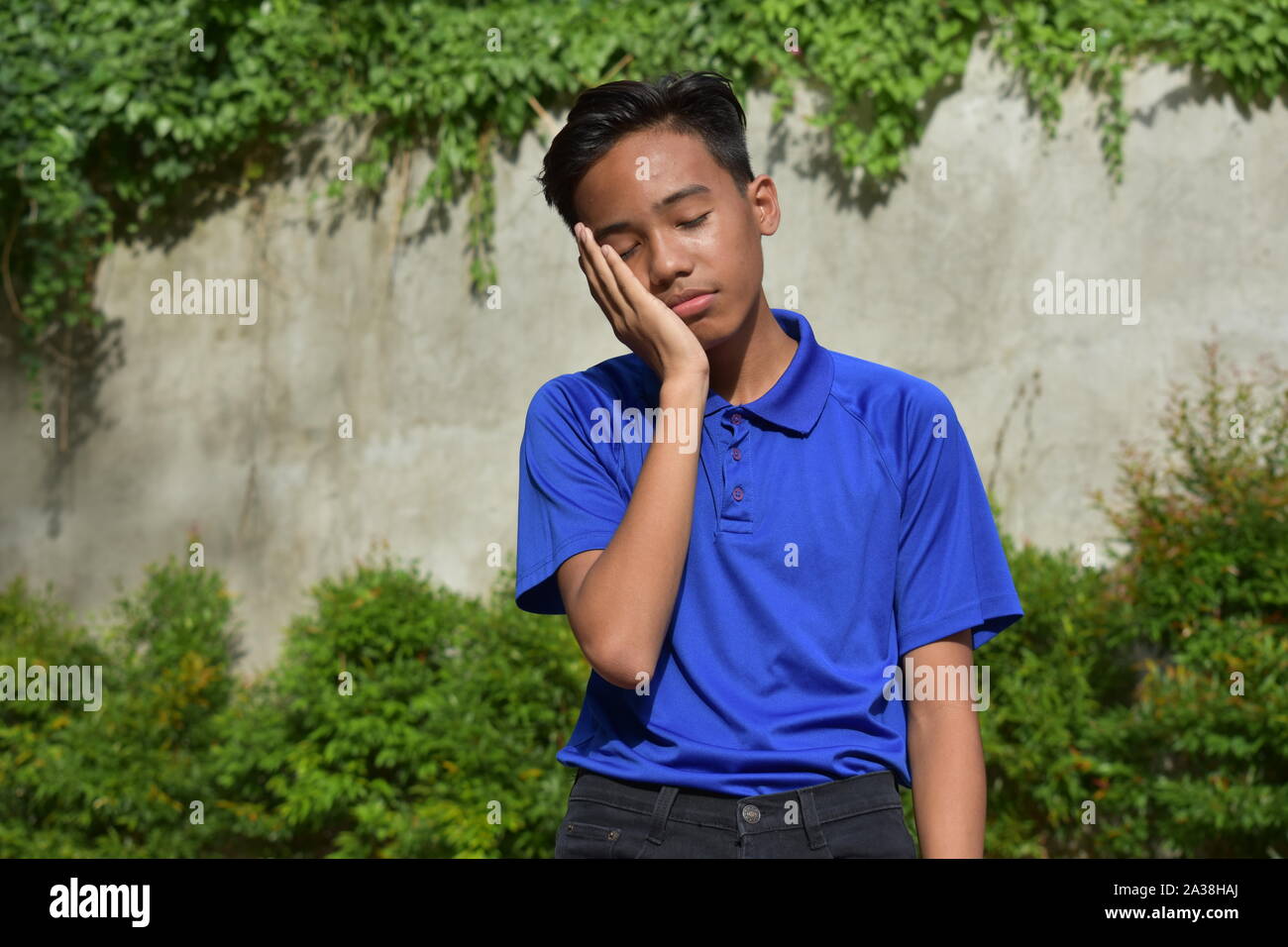 A Sad Filipino Youth Stock Photo - Alamy