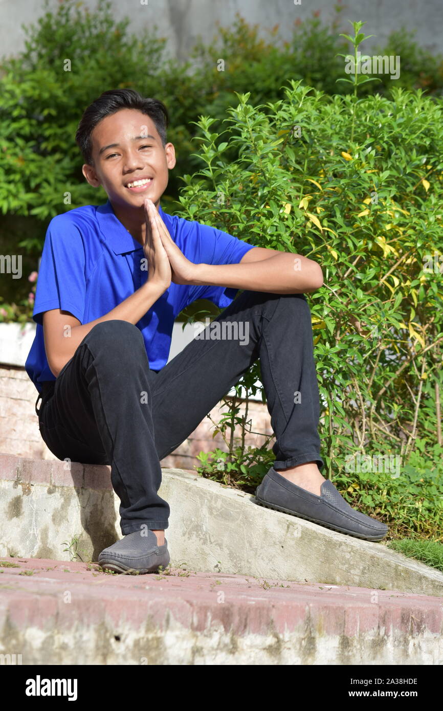 An A Handsome Boy Praying Stock Photo - Alamy