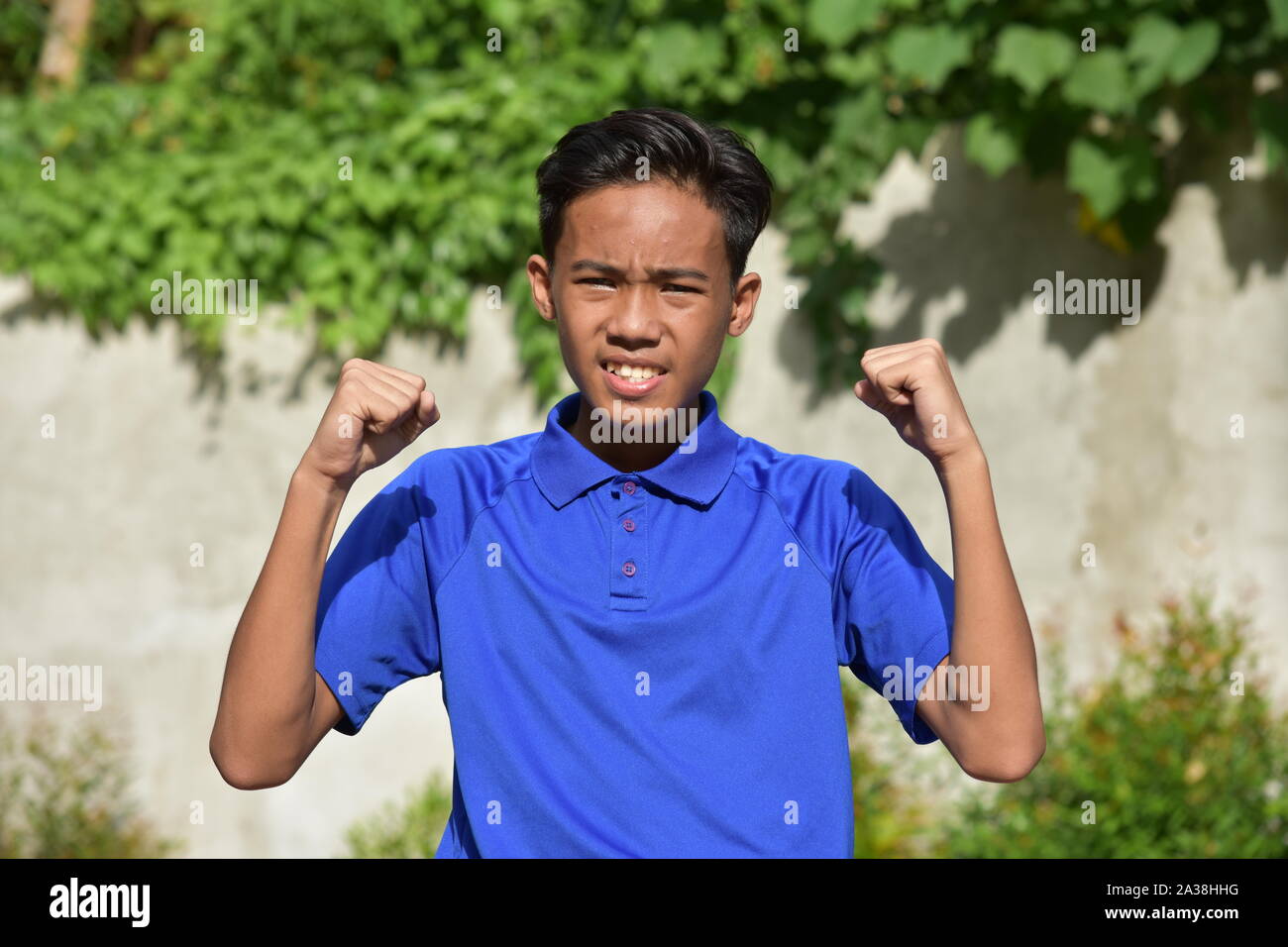 A Mad Filipino Youngster Stock Photo - Alamy