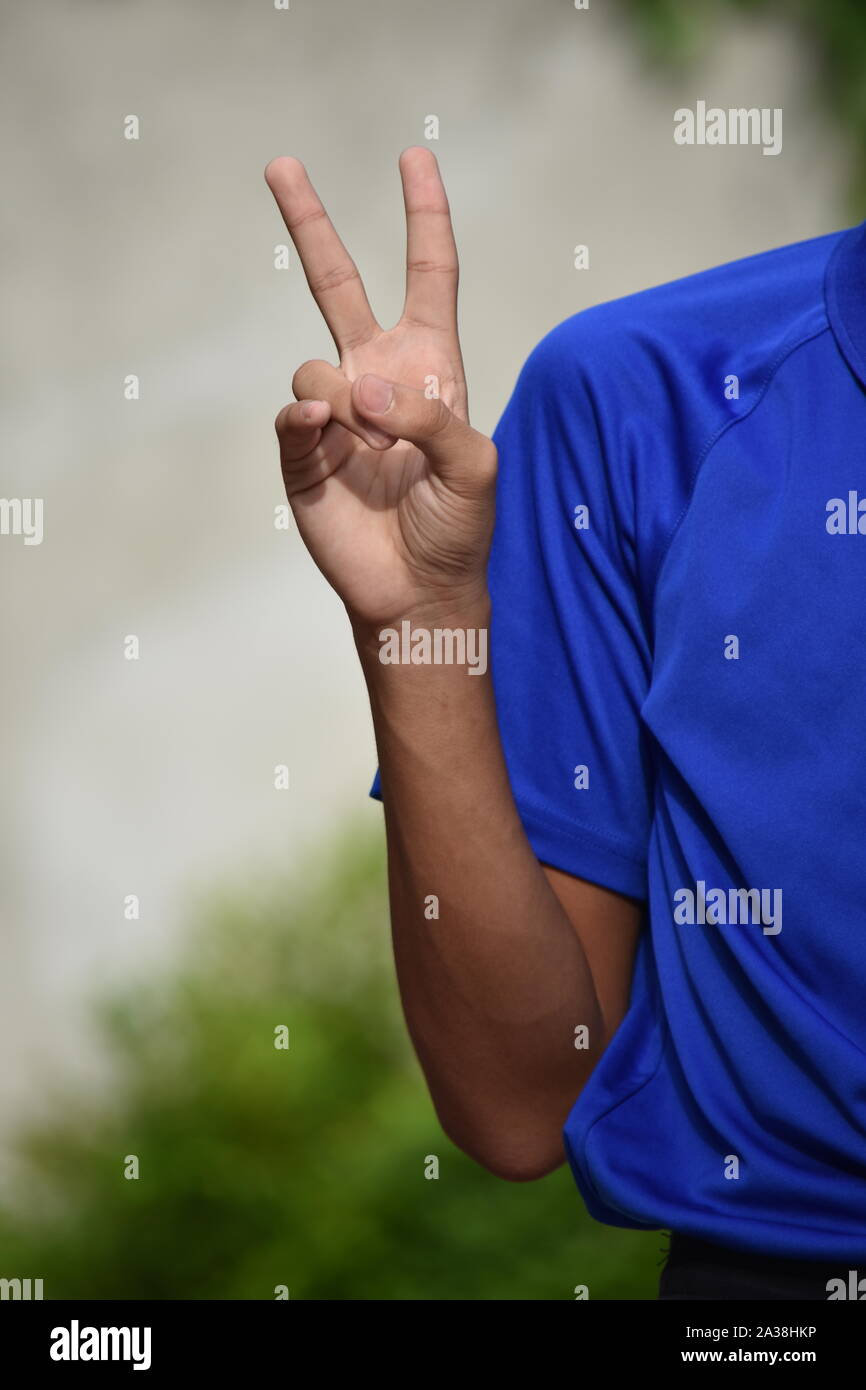 A Male And Peace Sign Stock Photo - Alamy