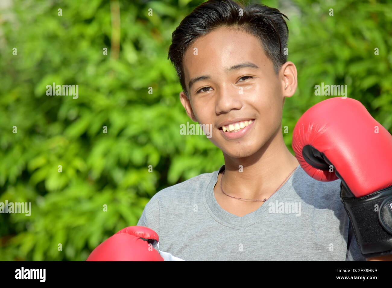 Happy Fitness Minority Person Wearing Boxing Gloves Stock Photo - Alamy