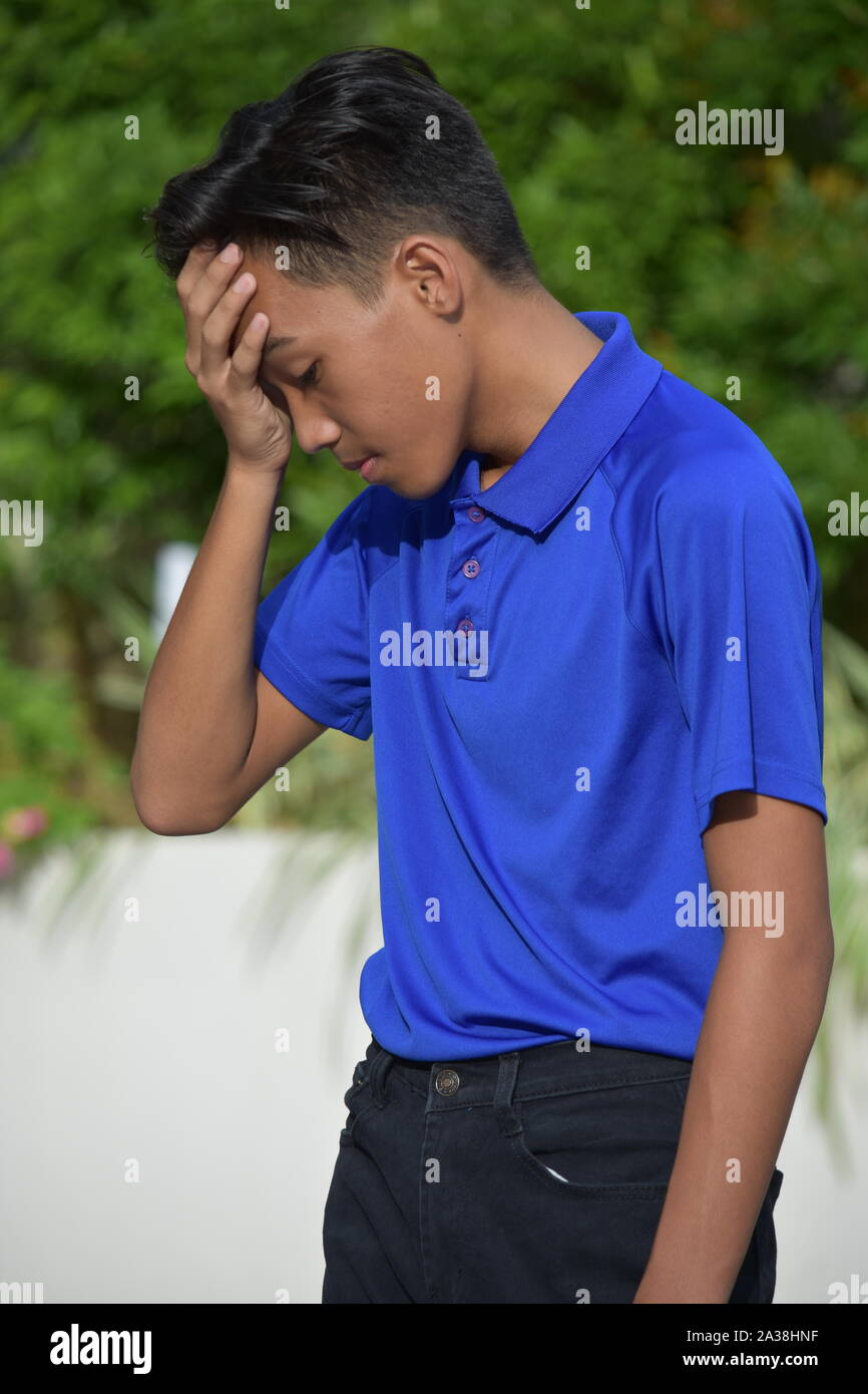 A Sad Filipino Person Stock Photo - Alamy