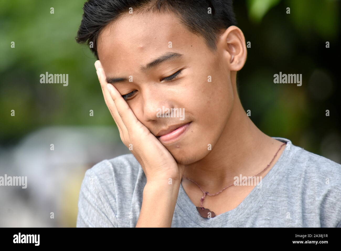 A Filipino Male And Sadness Stock Photo - Alamy