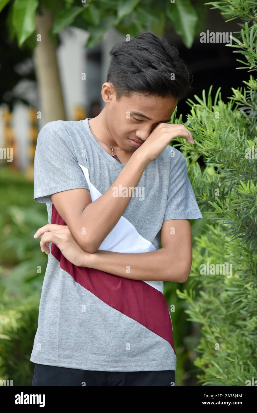 A Crying Young Asian Male Juvenile Stock Photo - Alamy
