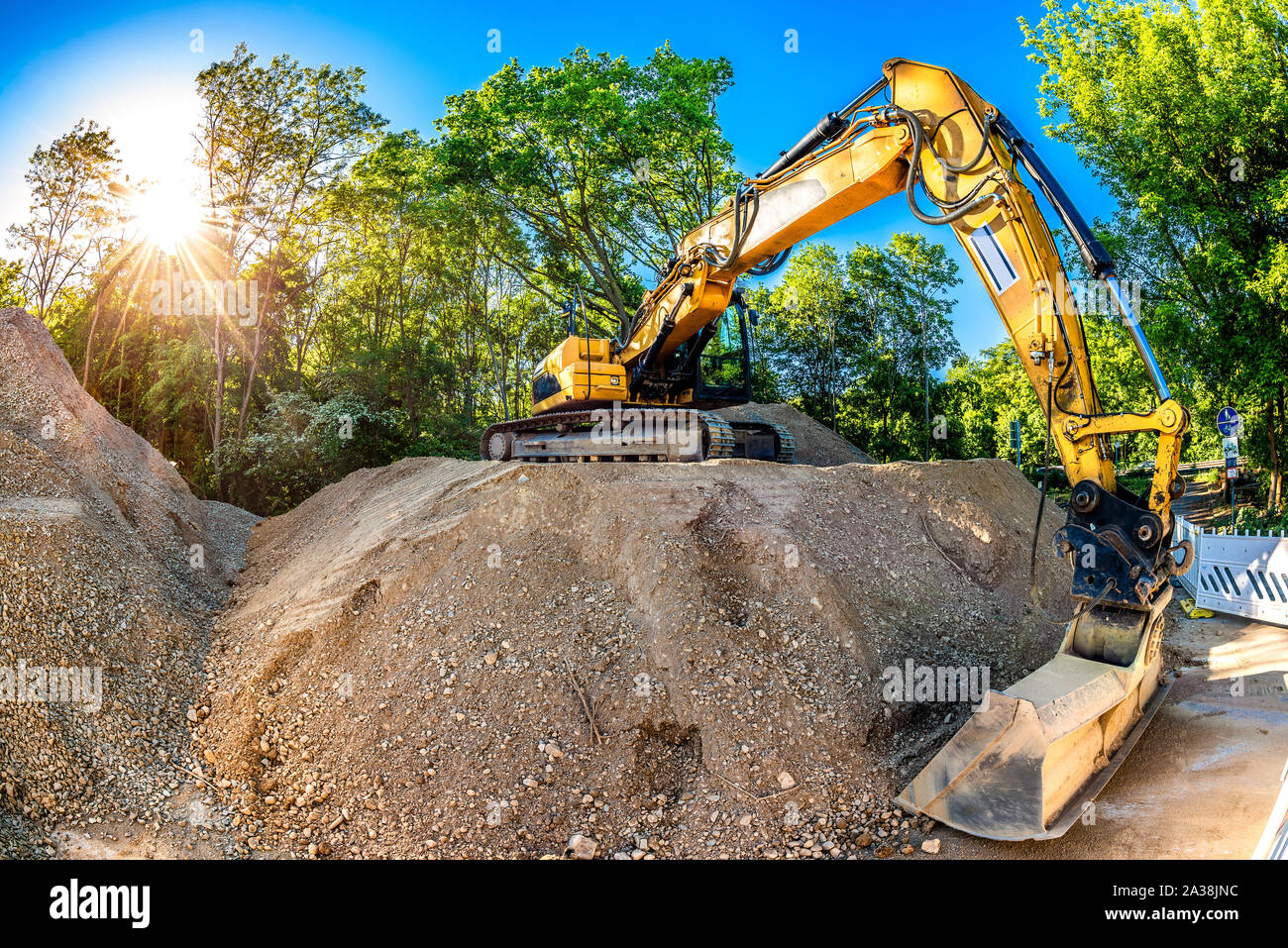 Big excavator in construction site Stock Photo - Alamy