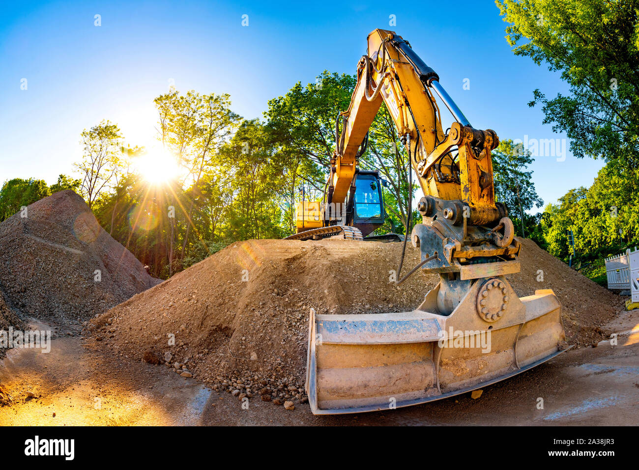 Big excavator in construction site Stock Photo - Alamy