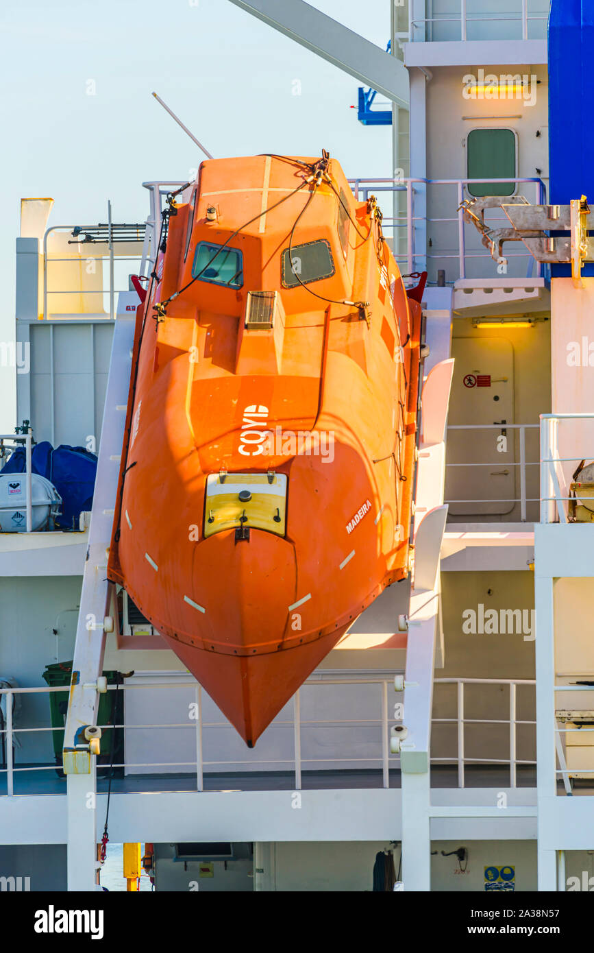 Emergency freefall lifeboat on the rear of a petrol tanker. The ...