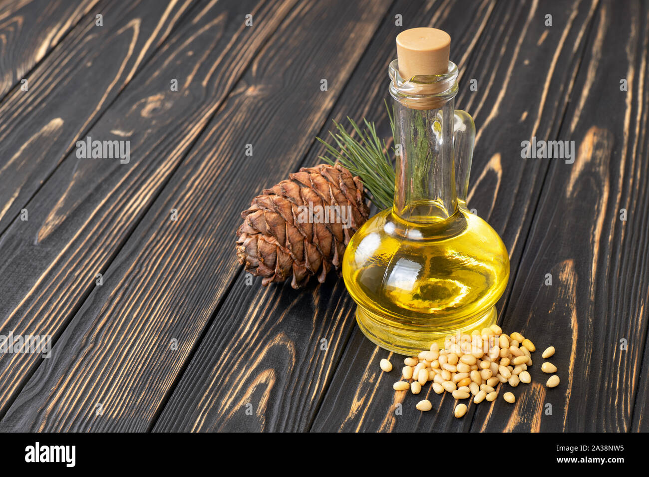 cedar oil in glass bottle Stock Photo - Alamy