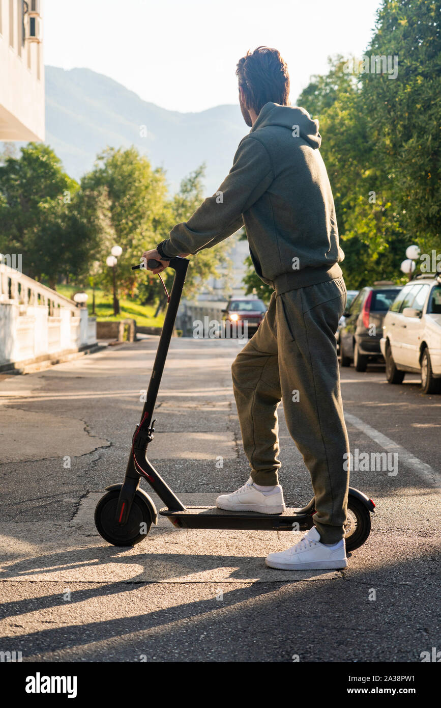 Man on scooter hi-res stock photography and images - Alamy