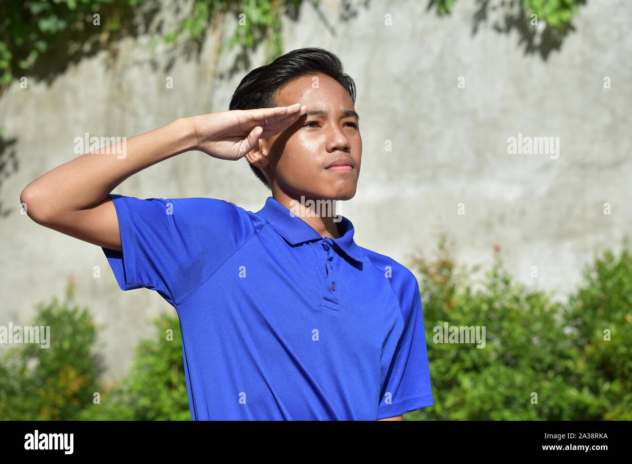 An A Filipino Male Saluting Stock Photo - Alamy
