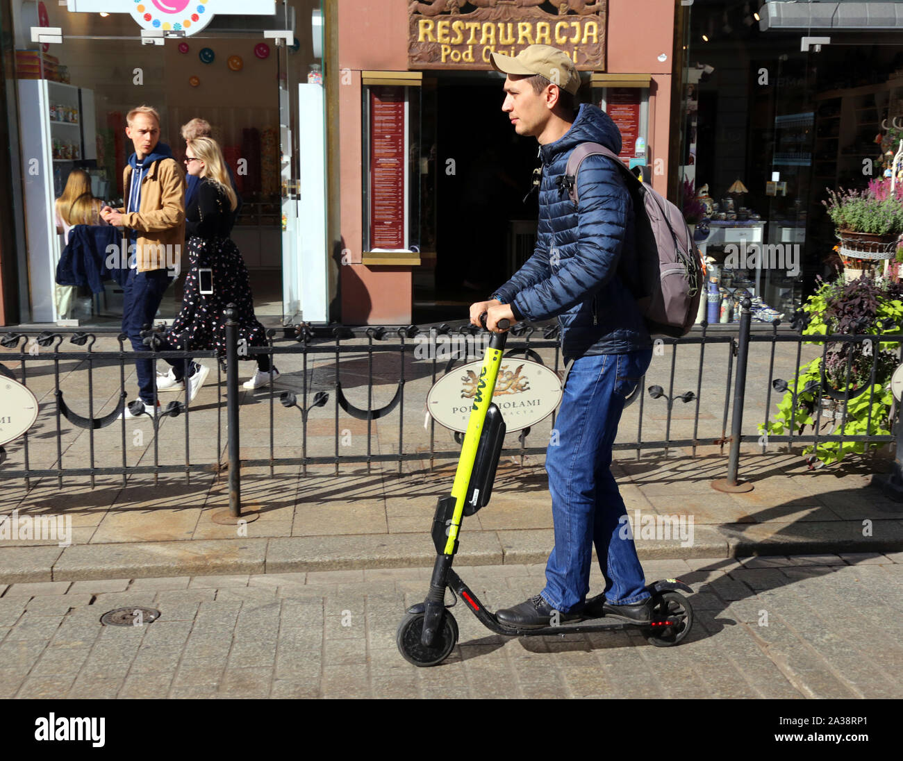 Man riding on an e scooter hi-res stock photography and images - Alamy