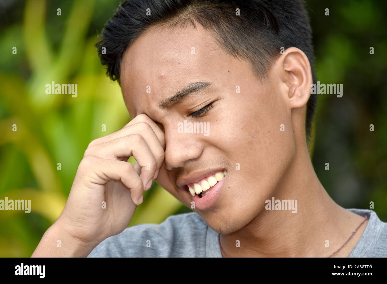 An An Asian Male Crying Stock Photo - Alamy