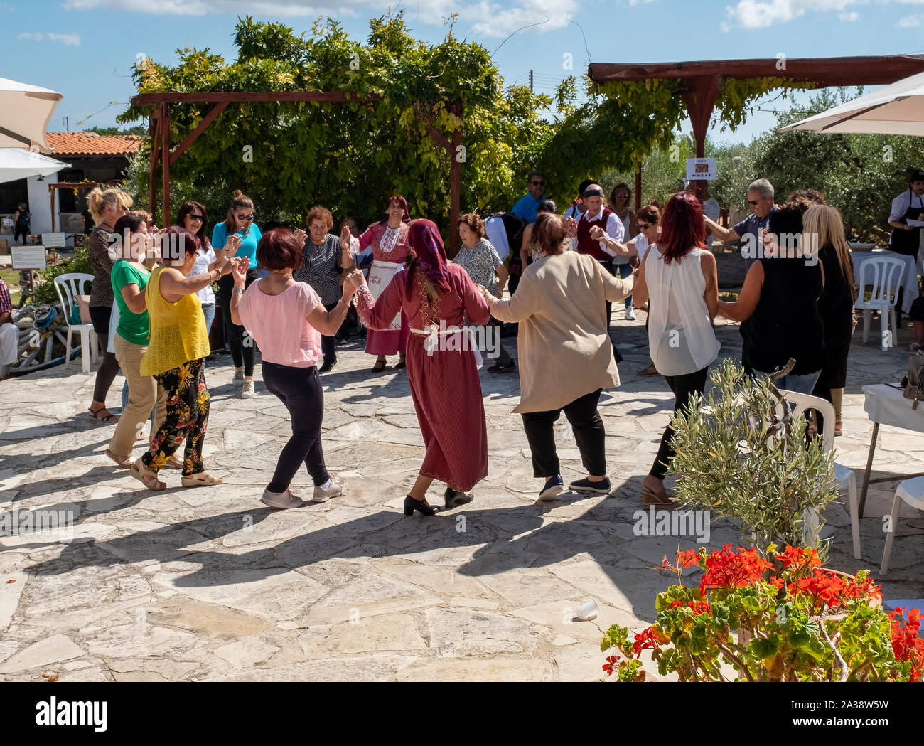 Cypriot dancers performing in traditional costumes at the Oleastro ...