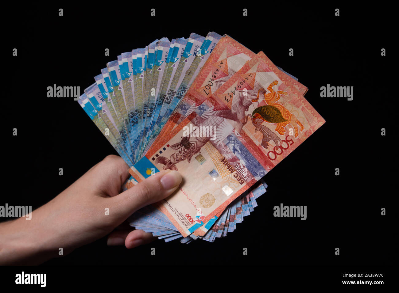 Tenge on black background. Kazakh money. Banknotes tenge. Money ...