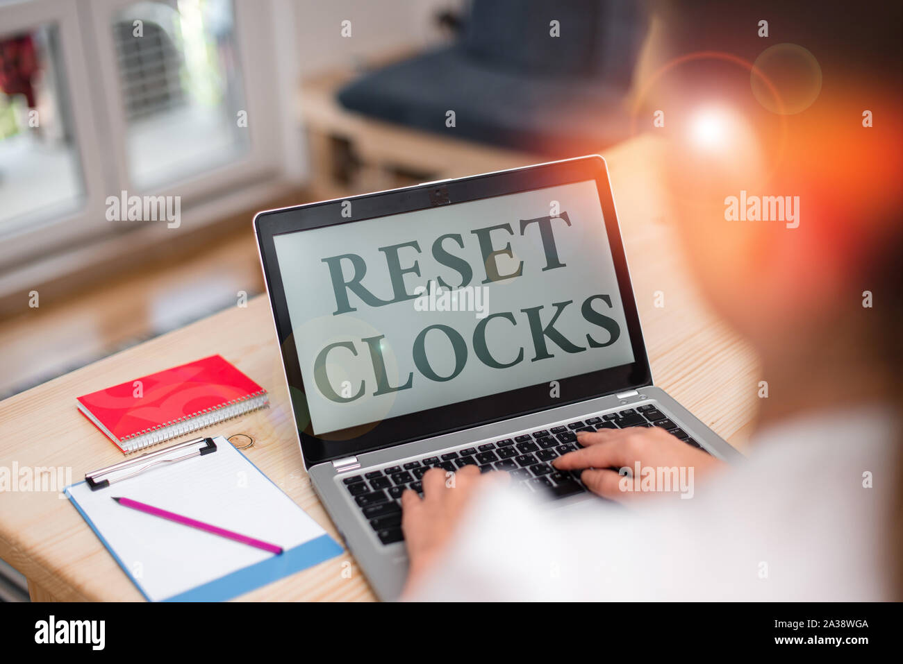 Handwriting text Reset Clocks. Conceptual photo To revisit return to or ...