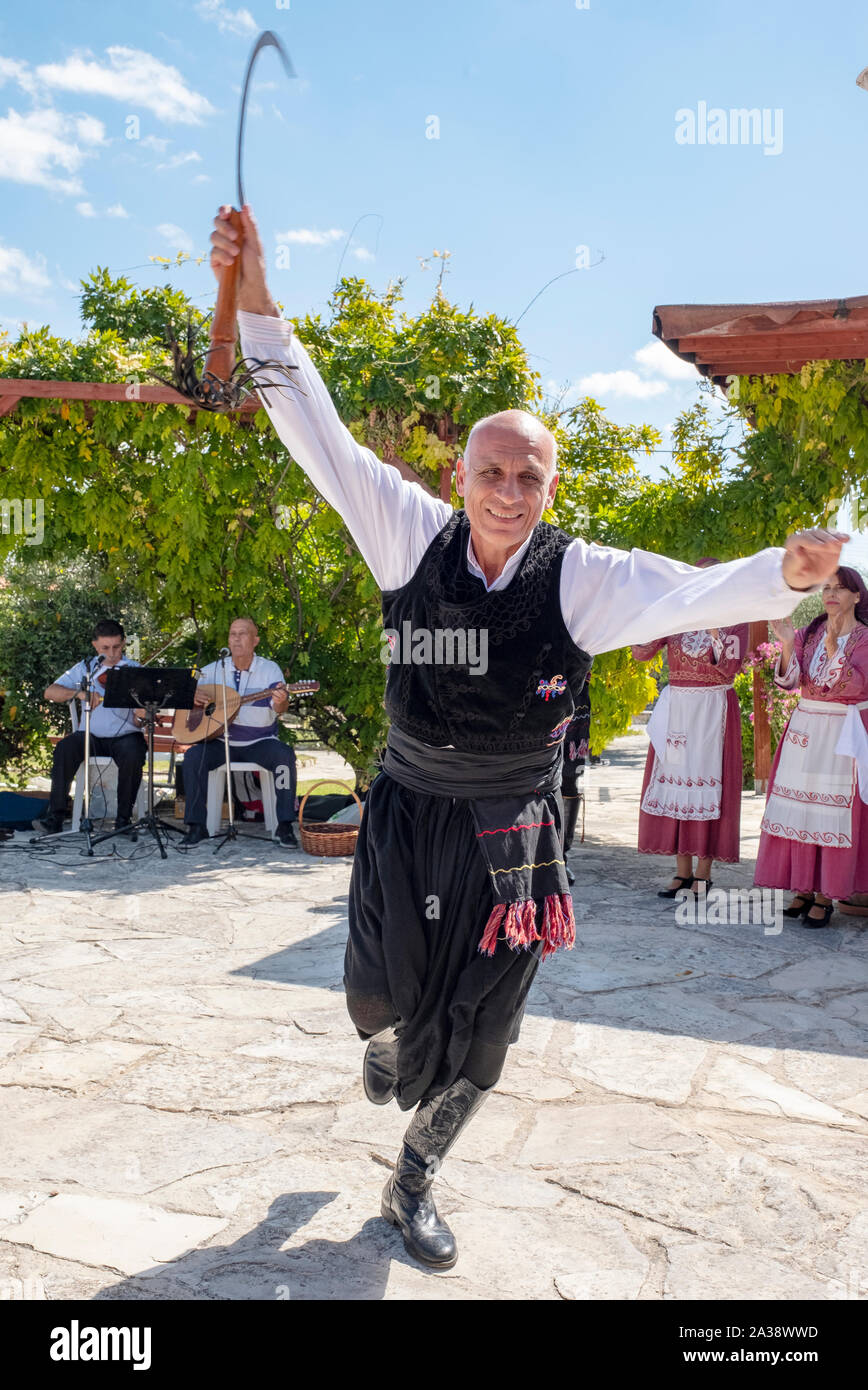 Cypriot dancers performing in traditional costumes at the Oleastro ...