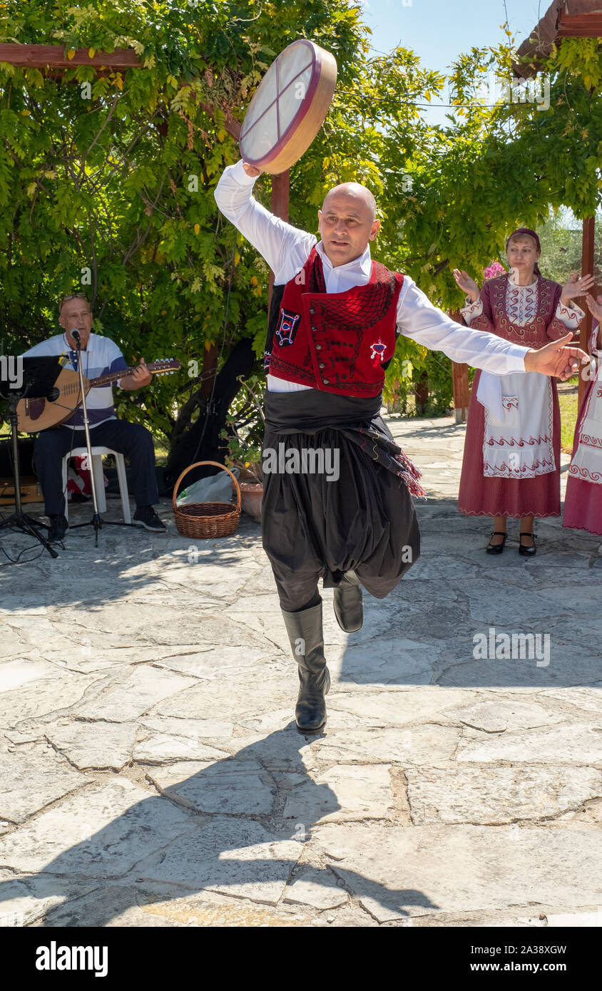 Cypriot dancers performing in traditional costumes at the Oleastro ...