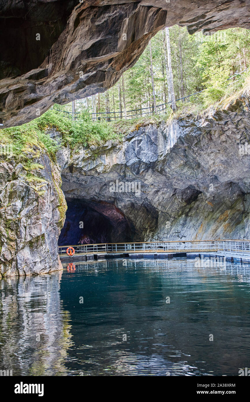 Types of a former underground marble quarry flooded with water. The ...