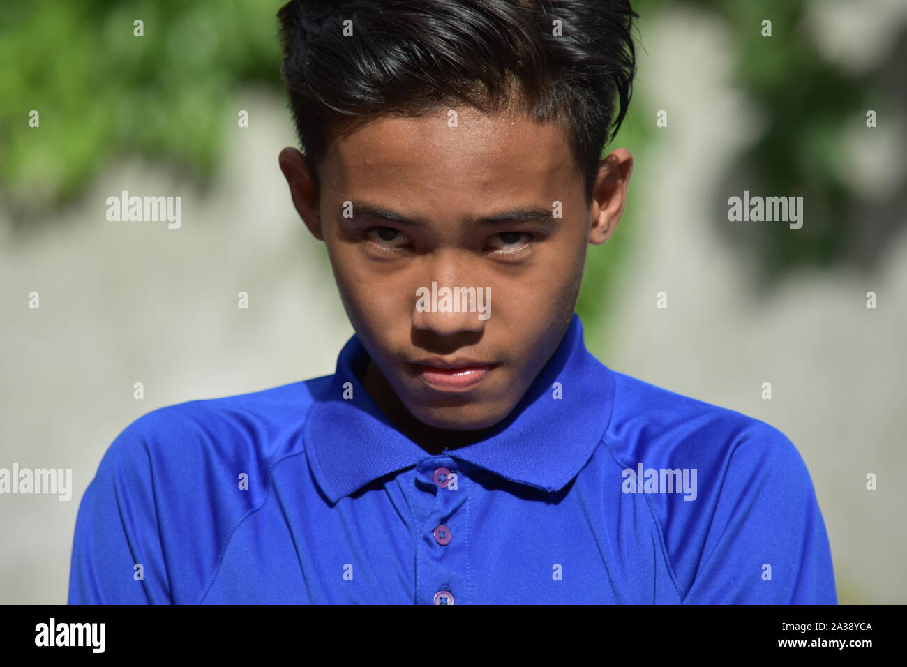 A Stubborn Good Looking Boy Stock Photo - Alamy