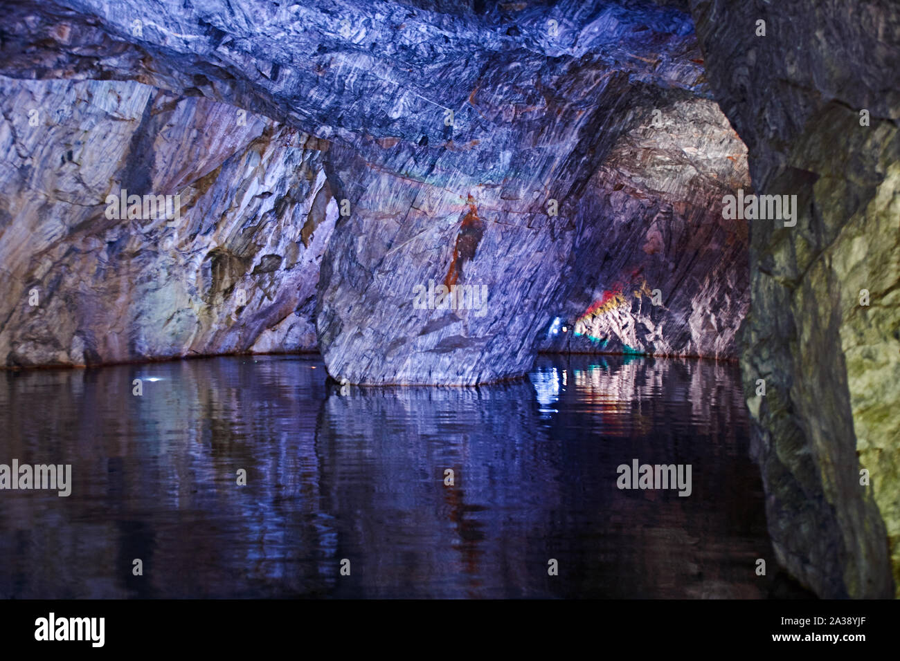 Types of a former underground marble quarry flooded with water. The ...