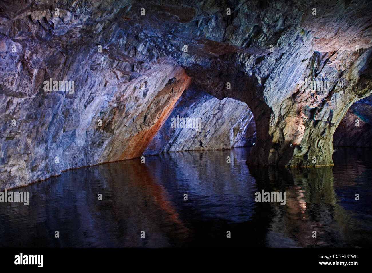Types of a former underground marble quarry flooded with water. The ...