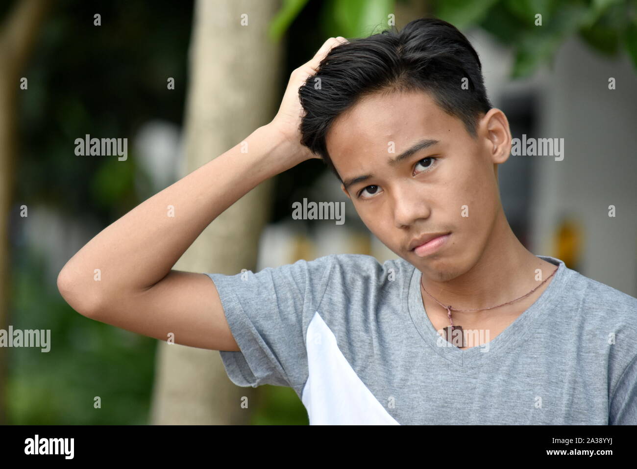 A Teenager Boy And Confusion Stock Photo - Alamy