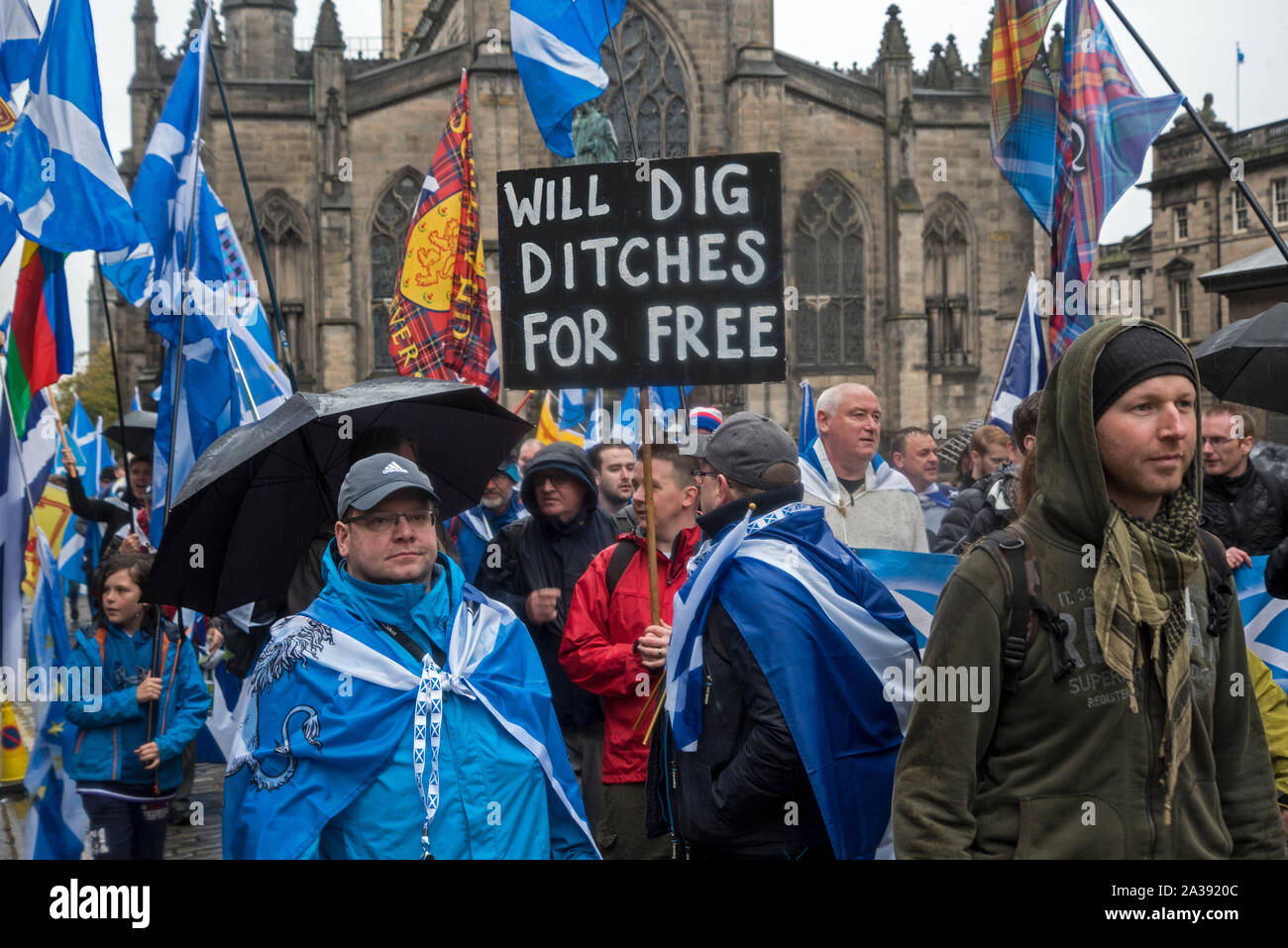 Marchers in the All Under One Banner (AUOB) procession make their way ...
