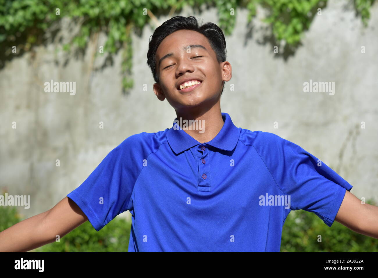 Young Filipino Boy Making A Decision Stock Photo - Alamy