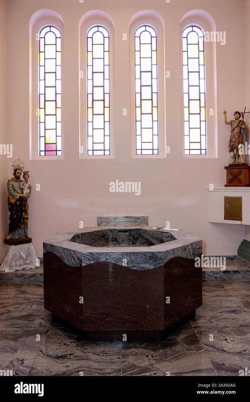 Vertical baptismal font in hi-res stock photography and images - Alamy