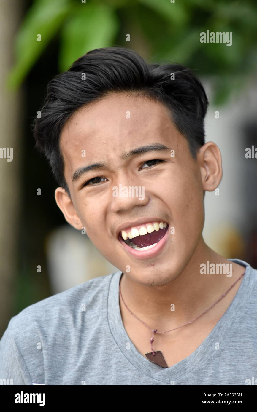 An A Filipino Youth Laughing Stock Photo - Alamy