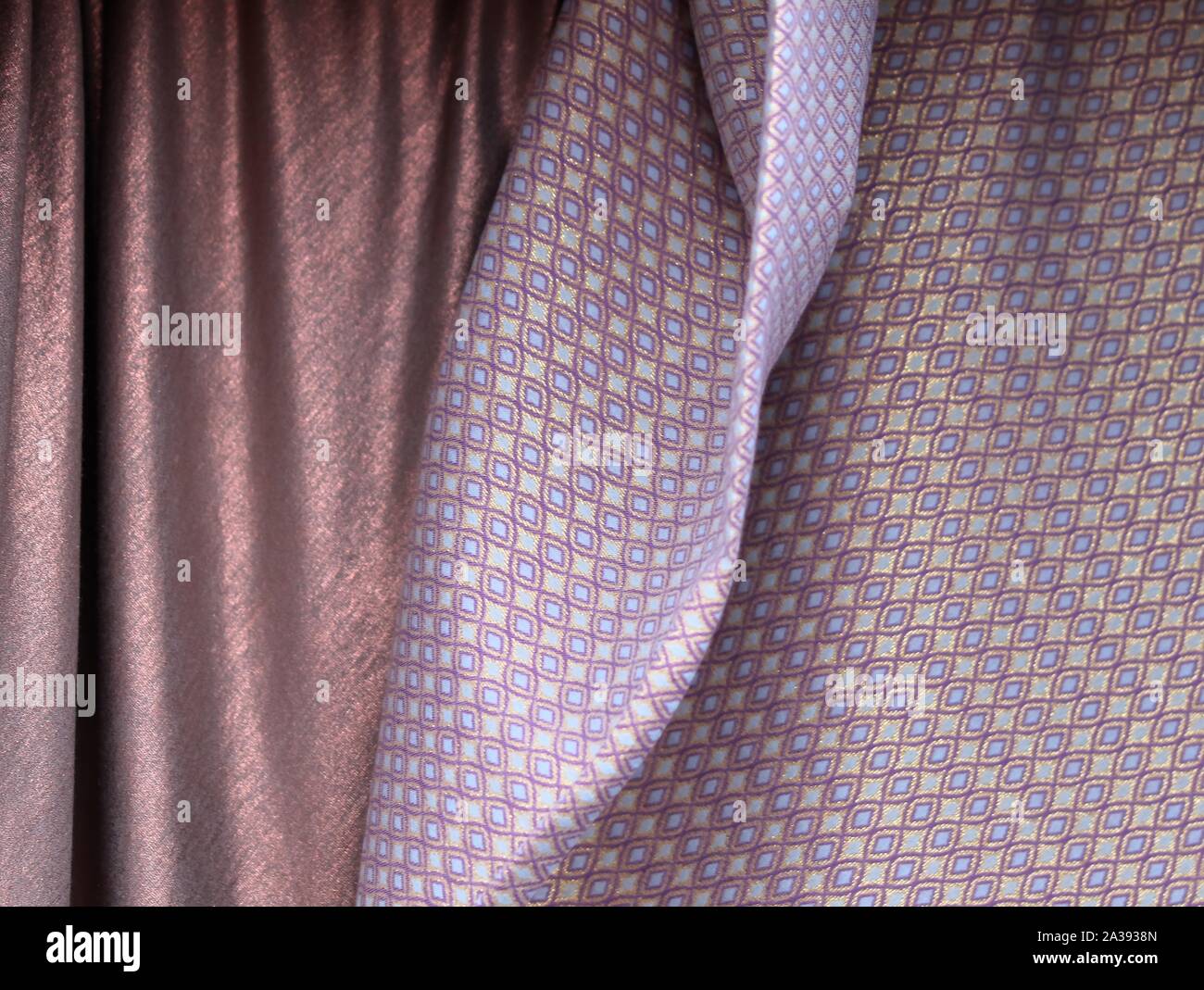 Highly detailed close up view on colorful textile and fabric textures ...