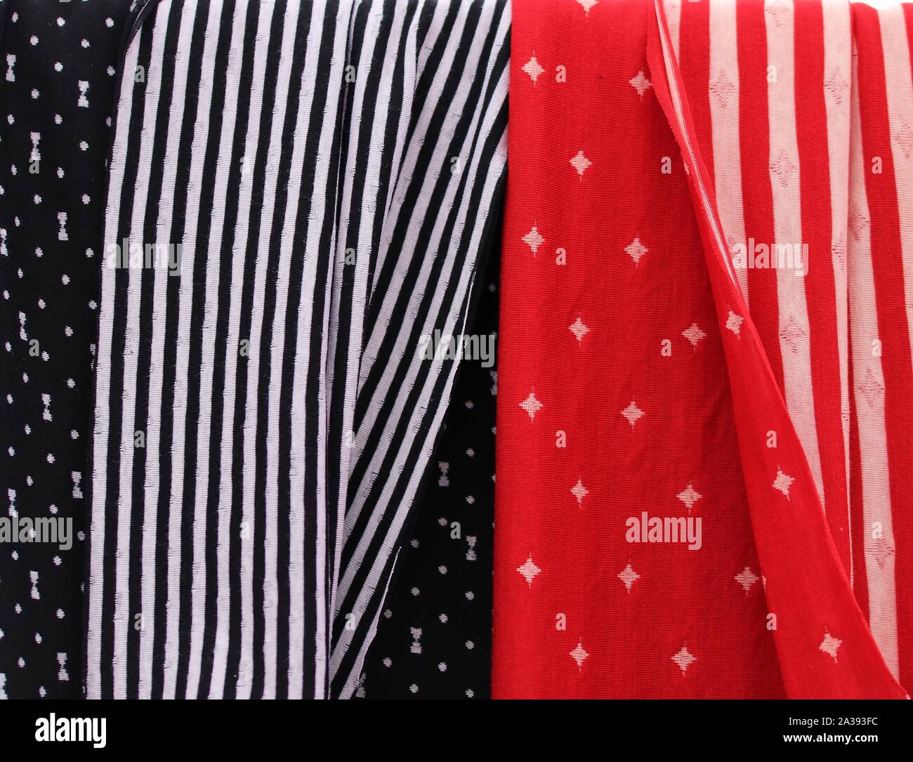 Highly detailed close up view on colorful textile and fabric textures ...