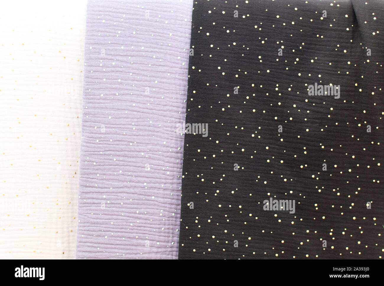 Highly detailed close up view on colorful textile and fabric textures ...